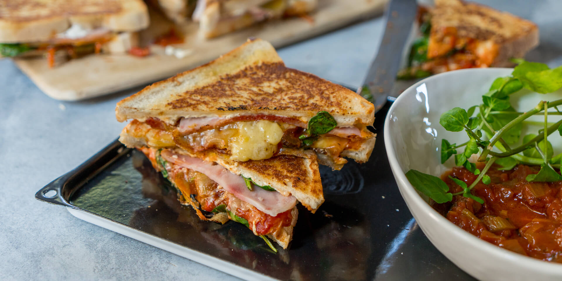 Pan-Toasted Ham, Cheese and Tomato Sarmie - Eskort